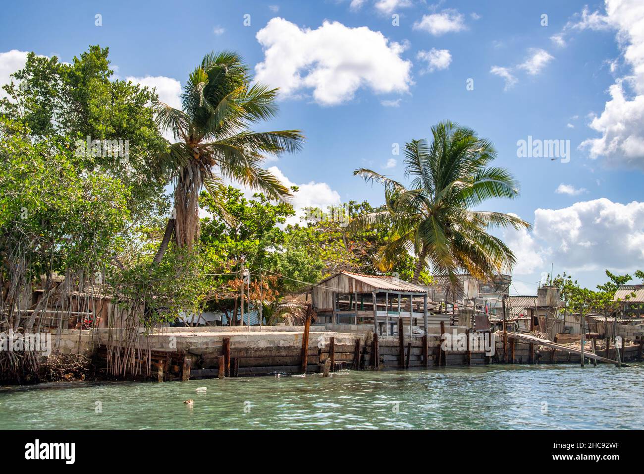 Run down buildings in coastline, Tunas de Zaza, Cuba Stock Photo - Alamy