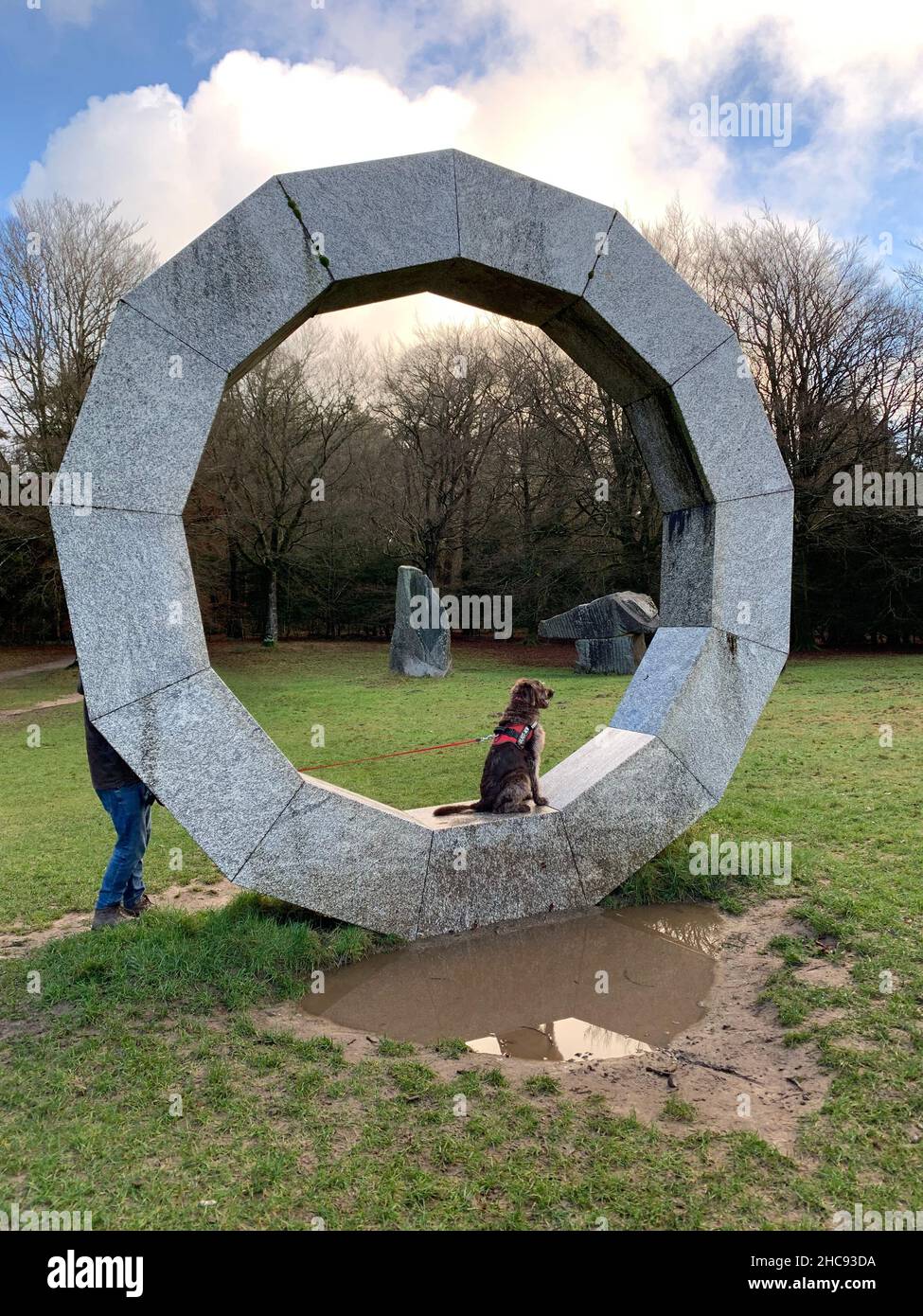 Dog sitting in sculpture Heavens Gate Wiltshire in Longleat Park near ...