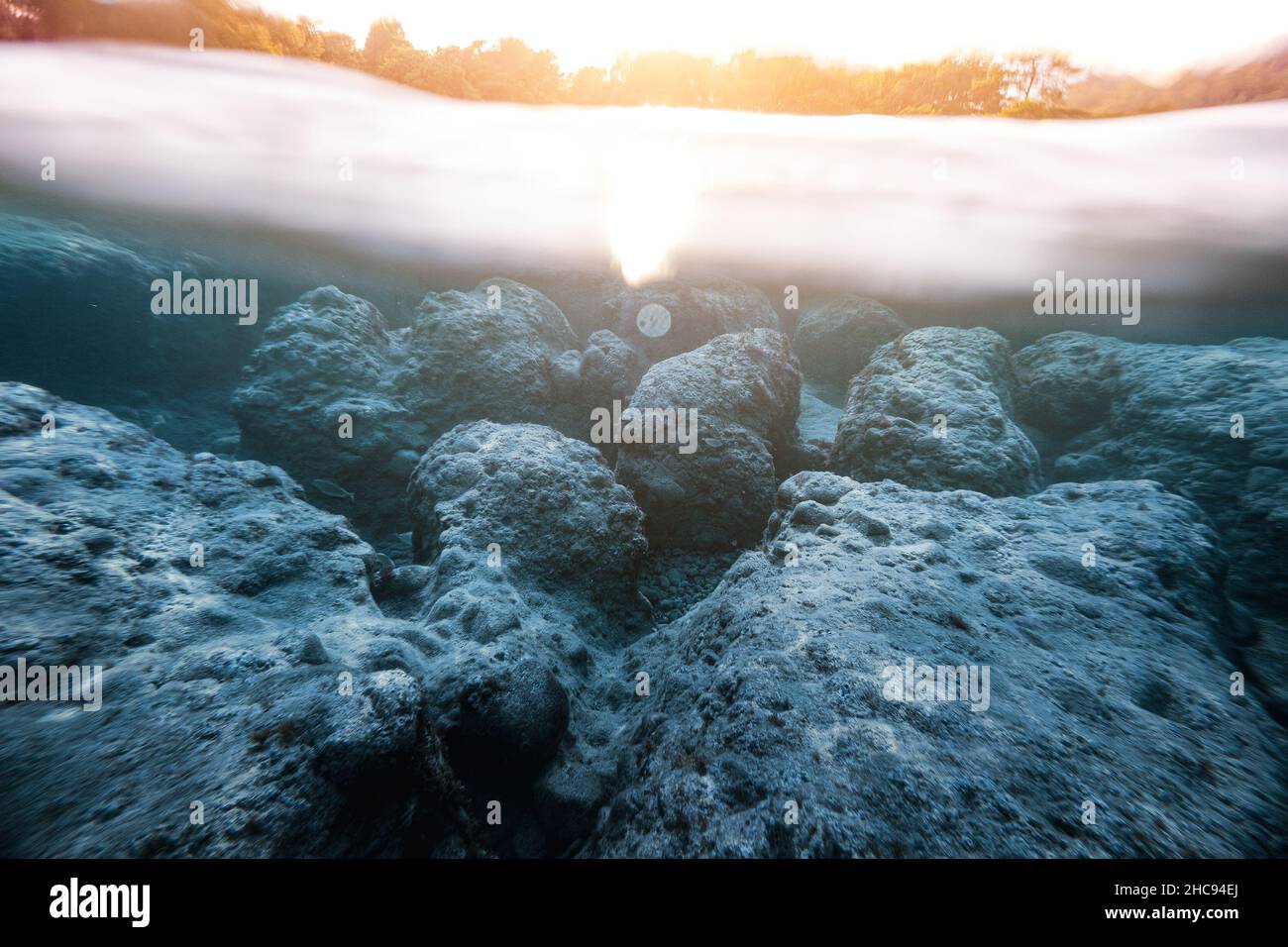 A deserted but fascinating underwater landscape with large rocks ...