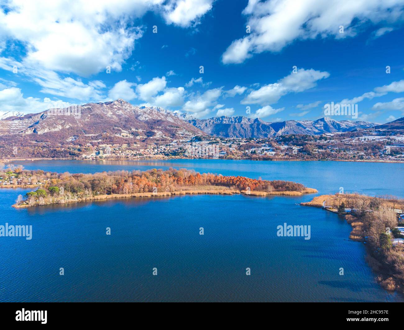 Aerial view of the city of Civate and Lake Annone during winter, Lecco ...