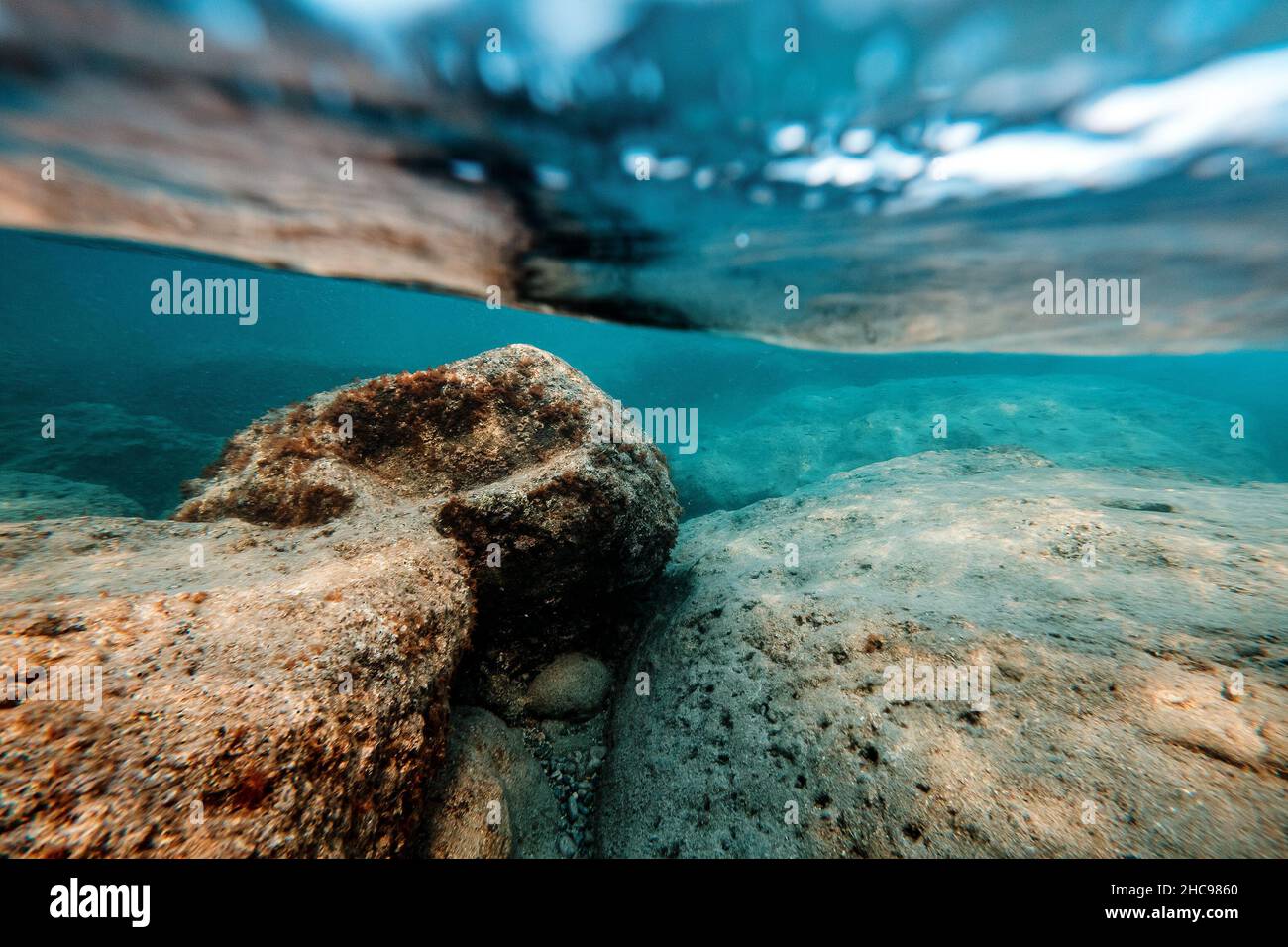 A deserted but fascinating underwater landscape with large rocks ...