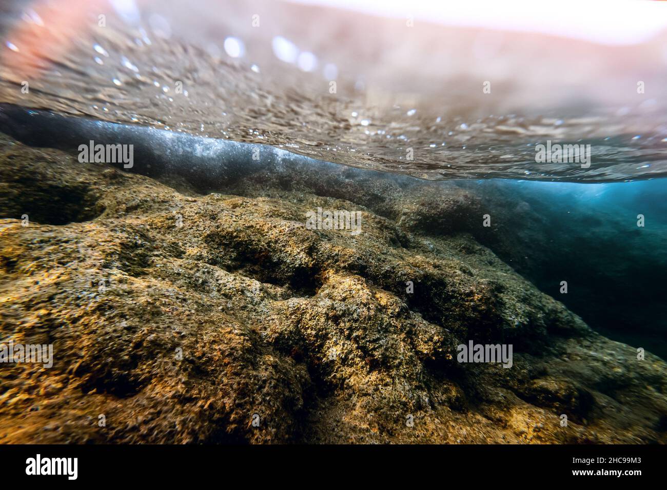 A deserted but fascinating underwater landscape with large rocks ...