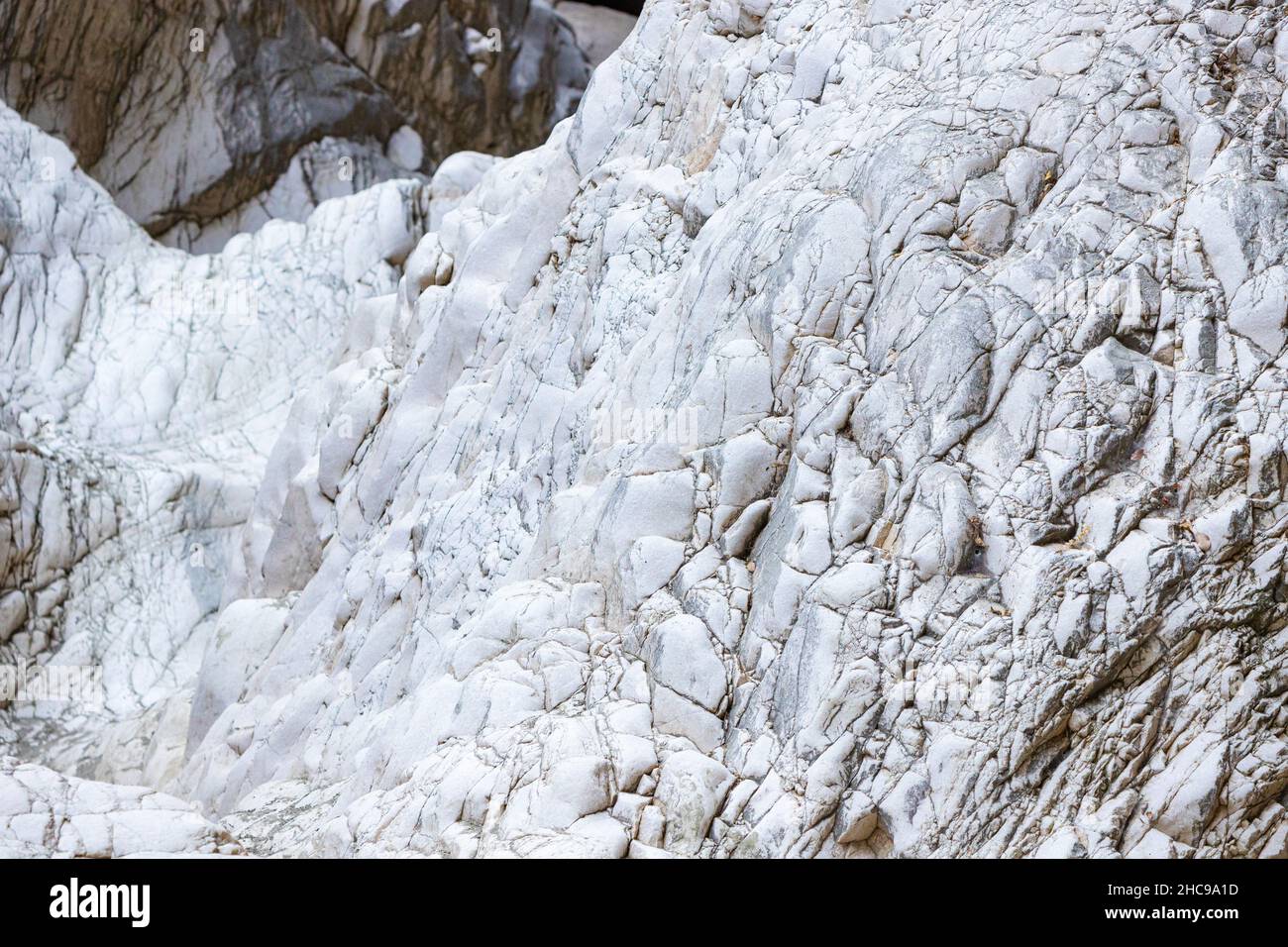 Textured stone surface in a mountain gorge, geology concept Stock Photo ...