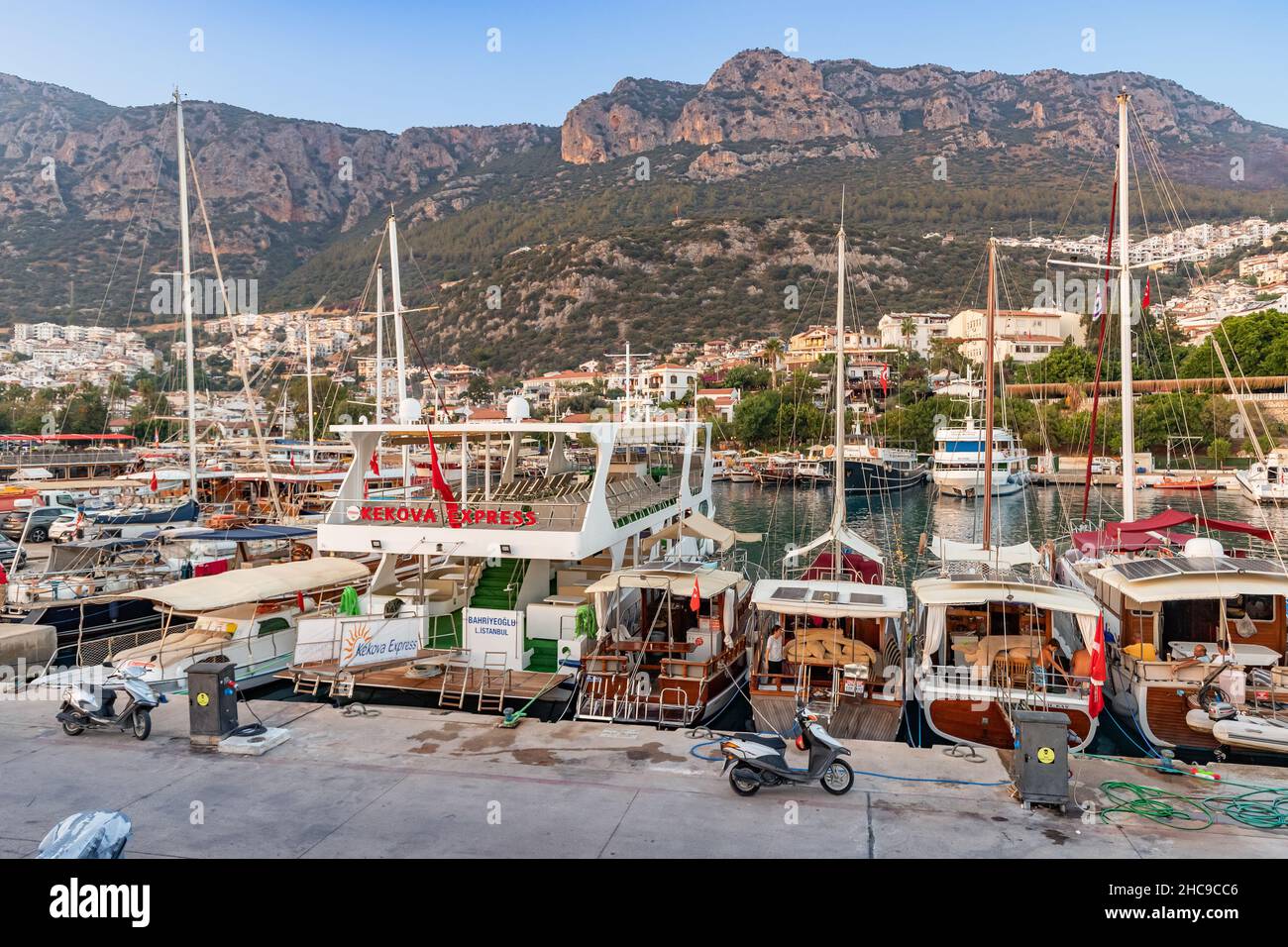 26 August 2021, Kas, Turkey: Excursion boats and yachts in marina port ...