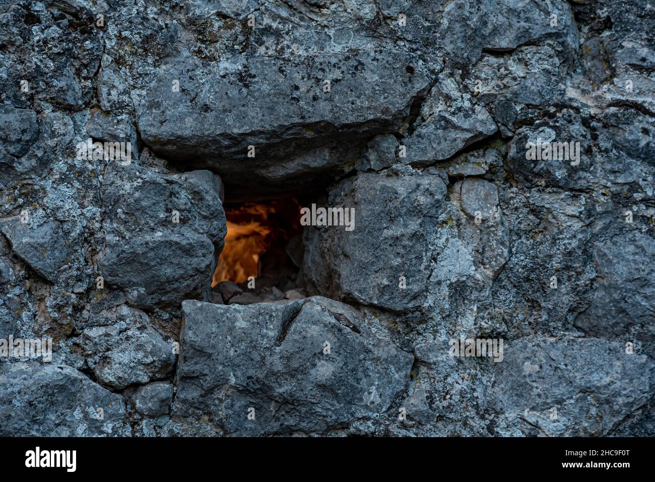 embrasure in the ancient fortress wall through which light breaks Stock ...