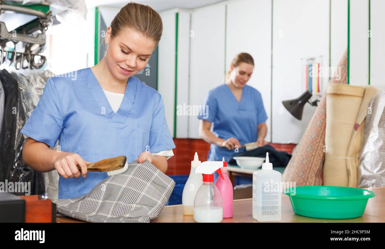Female worker of laundry Stock Photo - Alamy