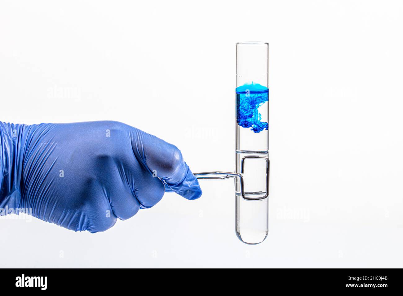 Researchers scientist working analysis with blue liquid test tube in ...