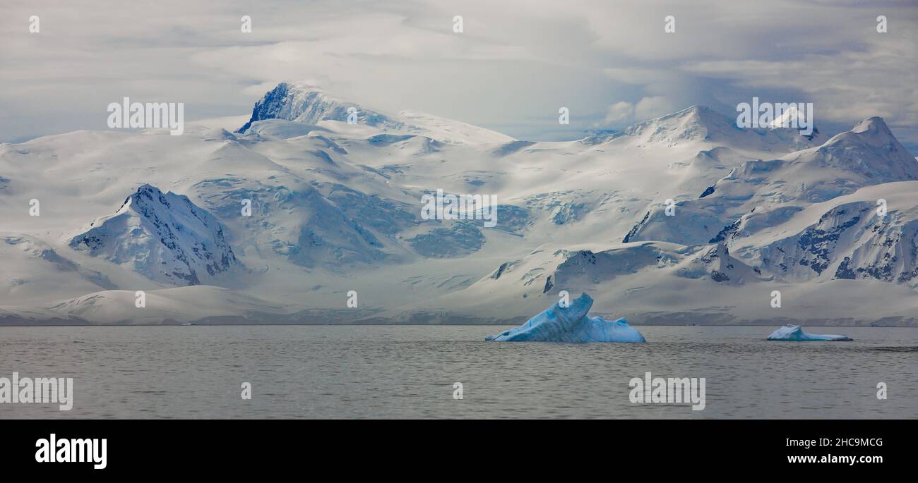 Antarctica iceberg floating snowy mountains hi-res stock photography ...
