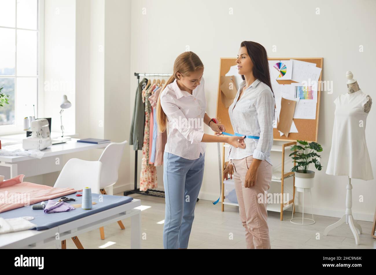 Fashion designer model fitting hi-res stock photography and images - Alamy