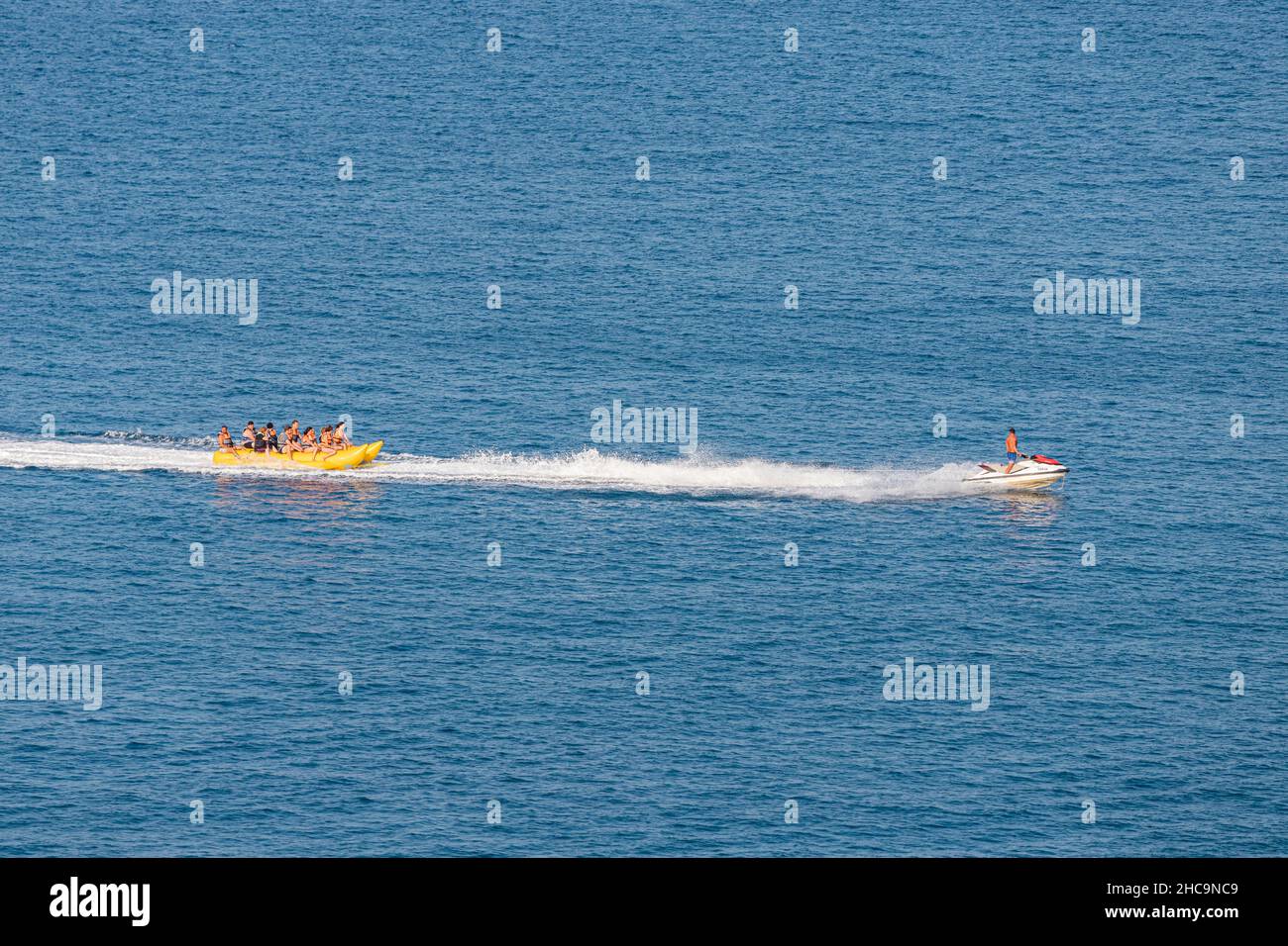 30 August 2021, Camyuva, Turkey: high-speed boat pulls an inflatable ...