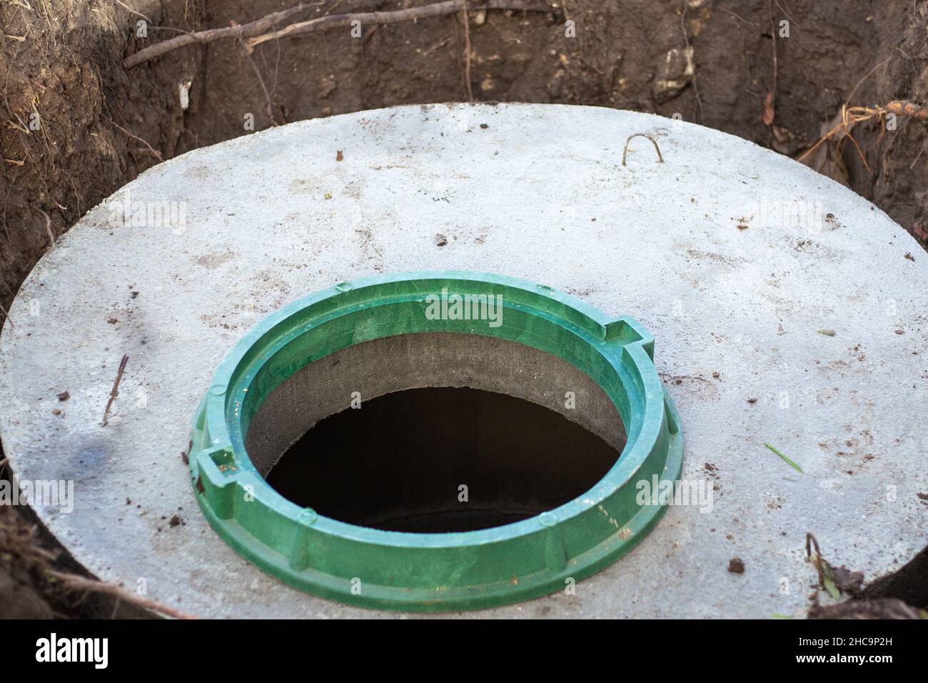Sewer well open hatch. Water supply and sewerage construction Stock ...