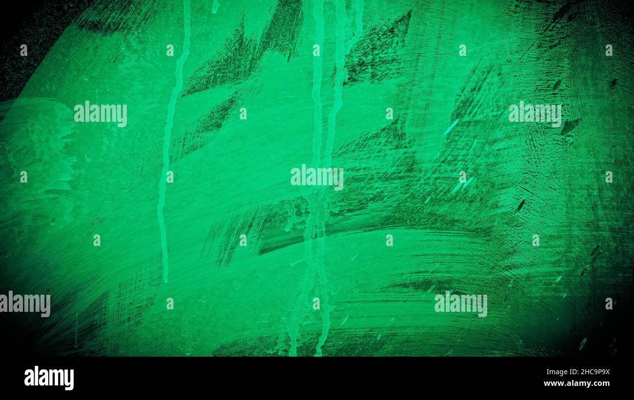 Splashes of acrylic paints on the wall, black and green combination ...