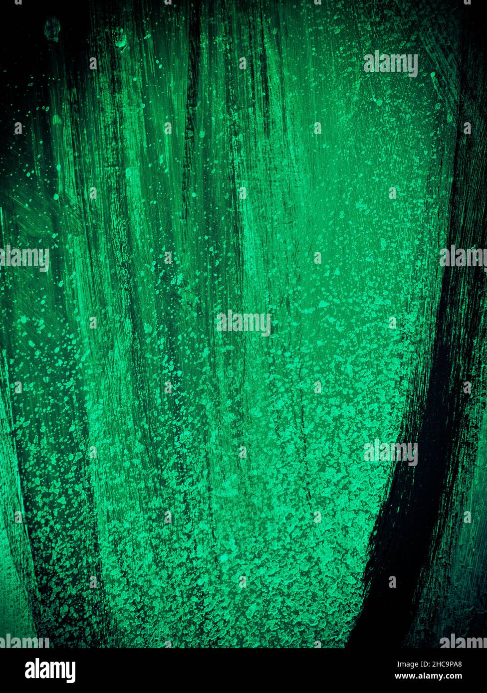 Splashes of acrylic paints on the wall, black and green combination ...