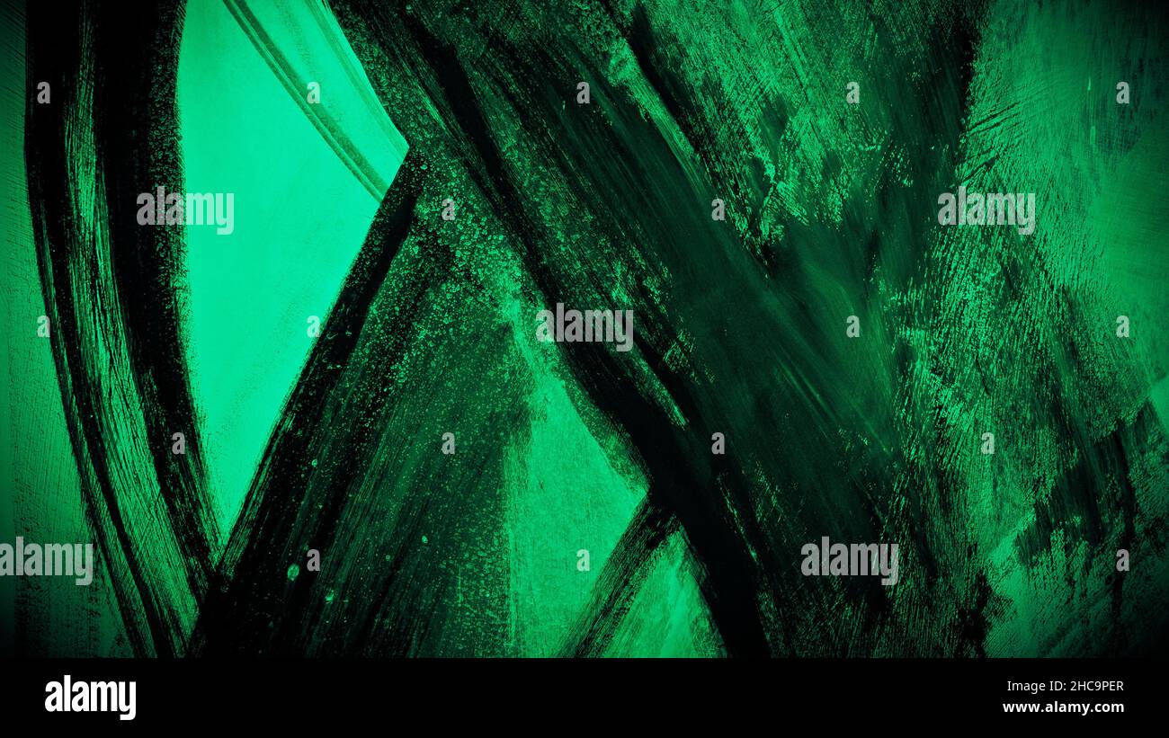 Splashes of acrylic paints on the wall, black and green combination ...