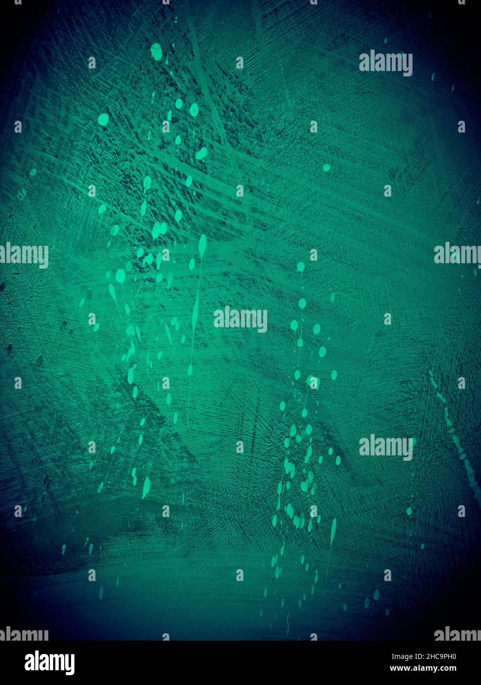 Splashes of acrylic paints on the wall, black and green combination ...