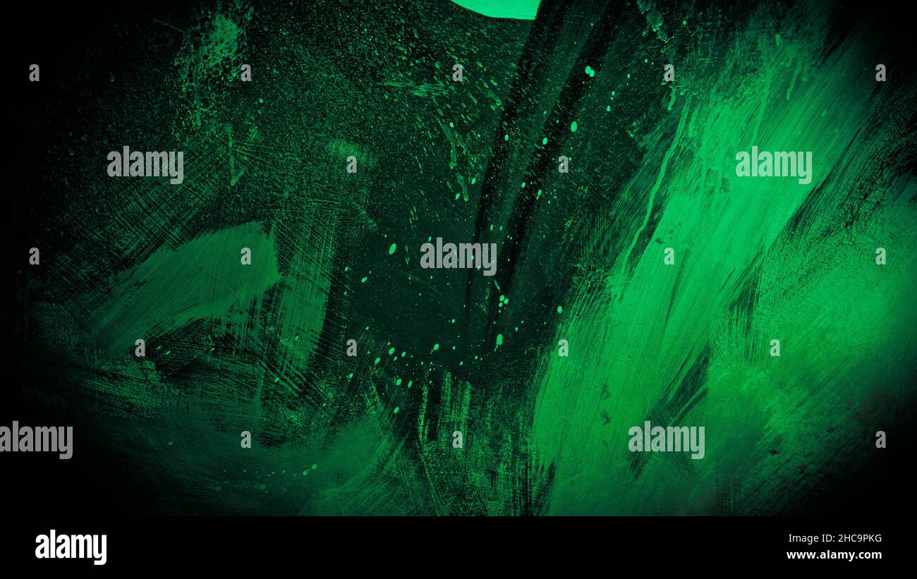 Splashes of acrylic paints on the wall, black and green combination ...