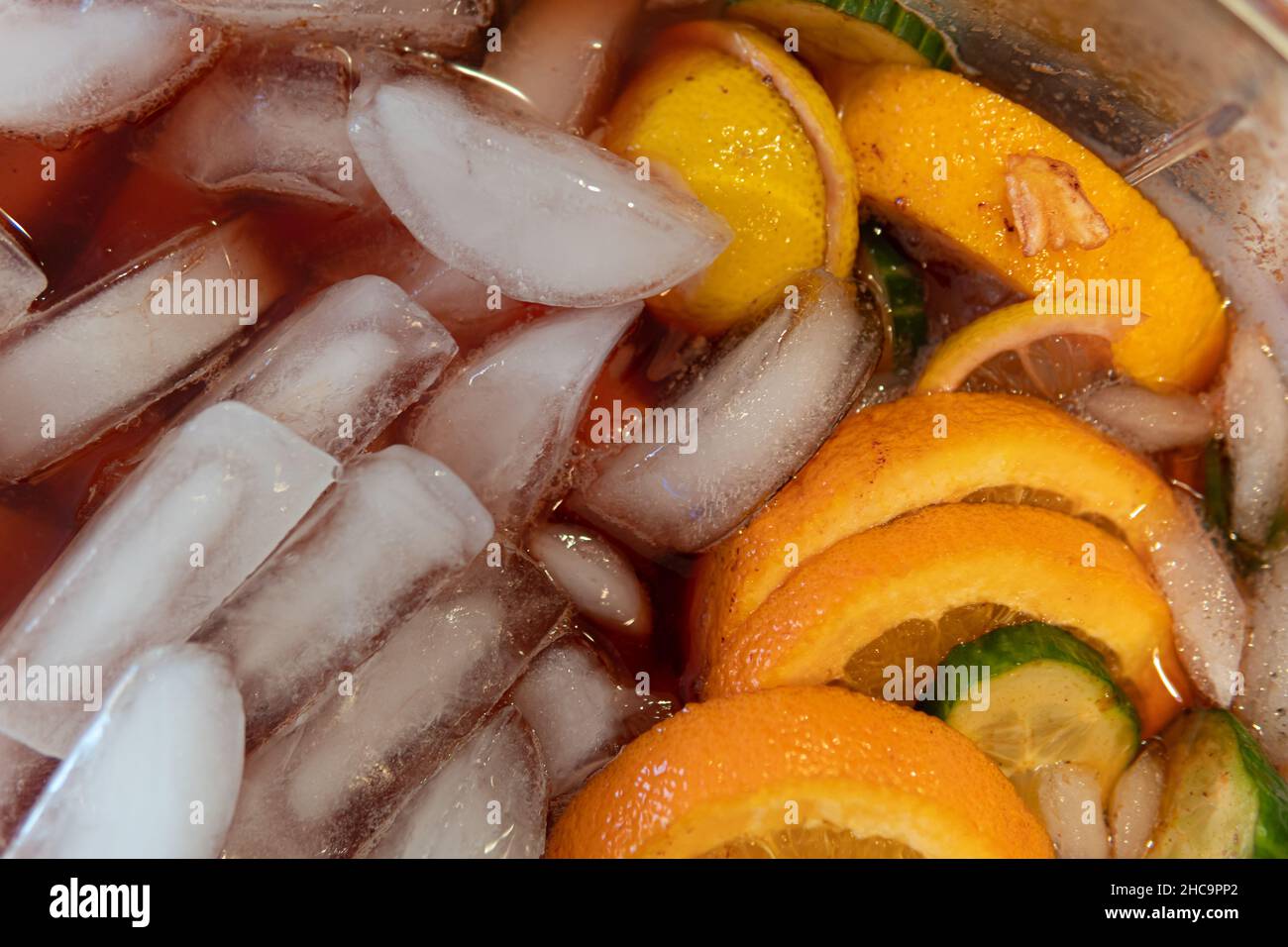 fruit punch in a drink dispenser at a party Stock Photo - Alamy