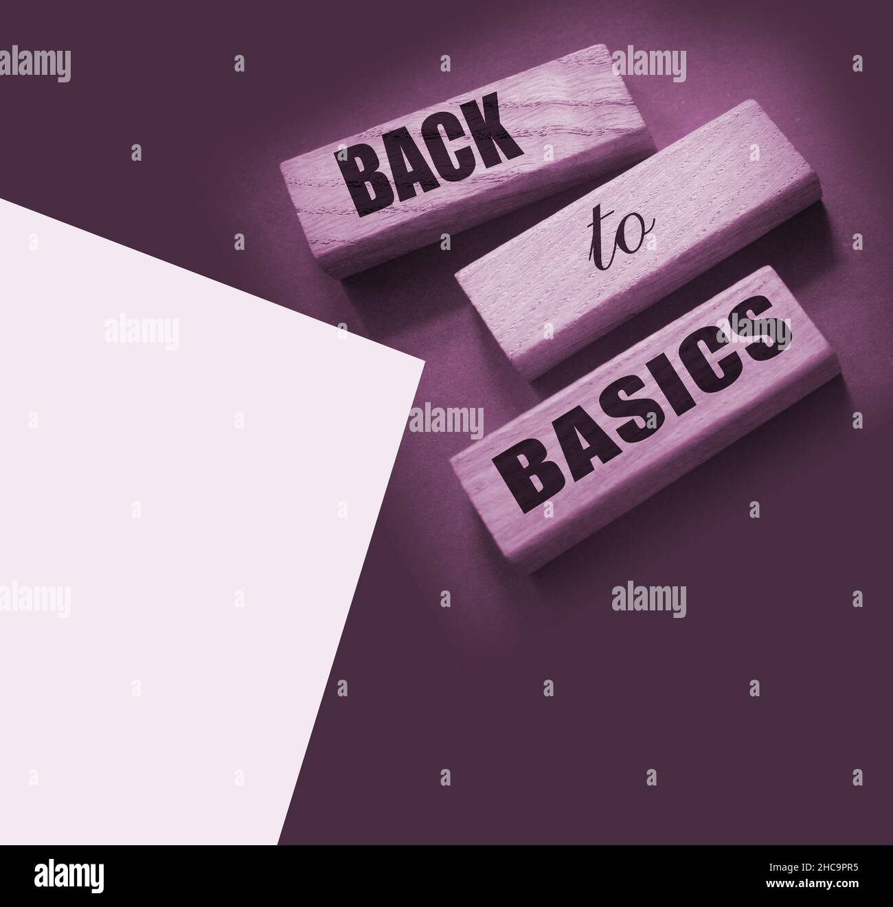 The words back to basics made of letters on wooden blocks. back to ...