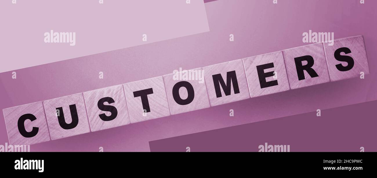 Customers word on wooden blockson green gradient background. B2C ...