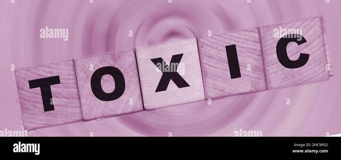 Toxic Word written on wooden cubes. Detox intoxication rehab stop ...
