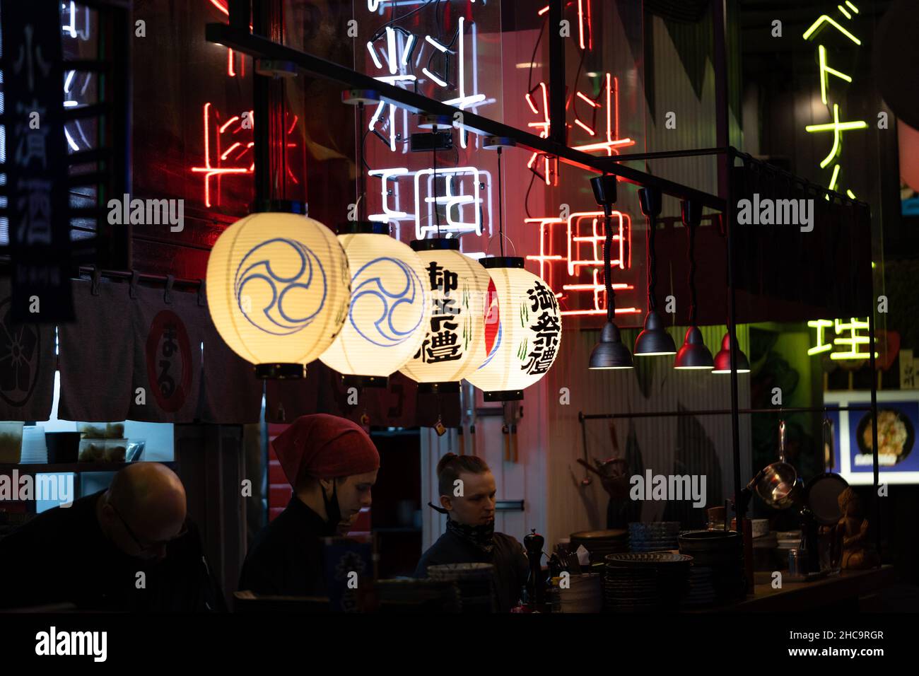 Trendy interior of asian restaurant decorated with chinese lanterns ...
