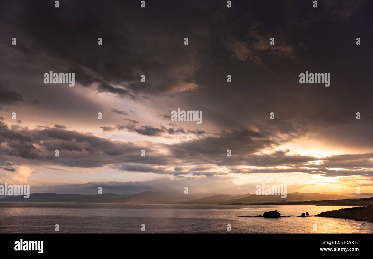 Beautiful sunset over sea, Akamas, Cyprus Stock Photo - Alamy