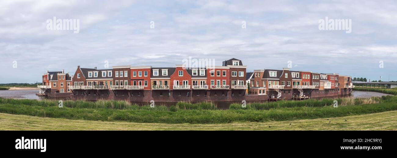 Sunny summer aerial cityscape of Gouda, cheese capital town in ...