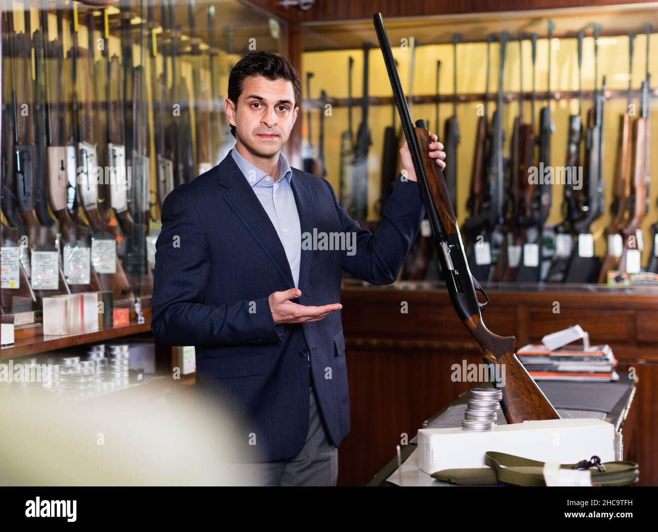 Man rifle barrel indoors hi-res stock photography and images - Alamy