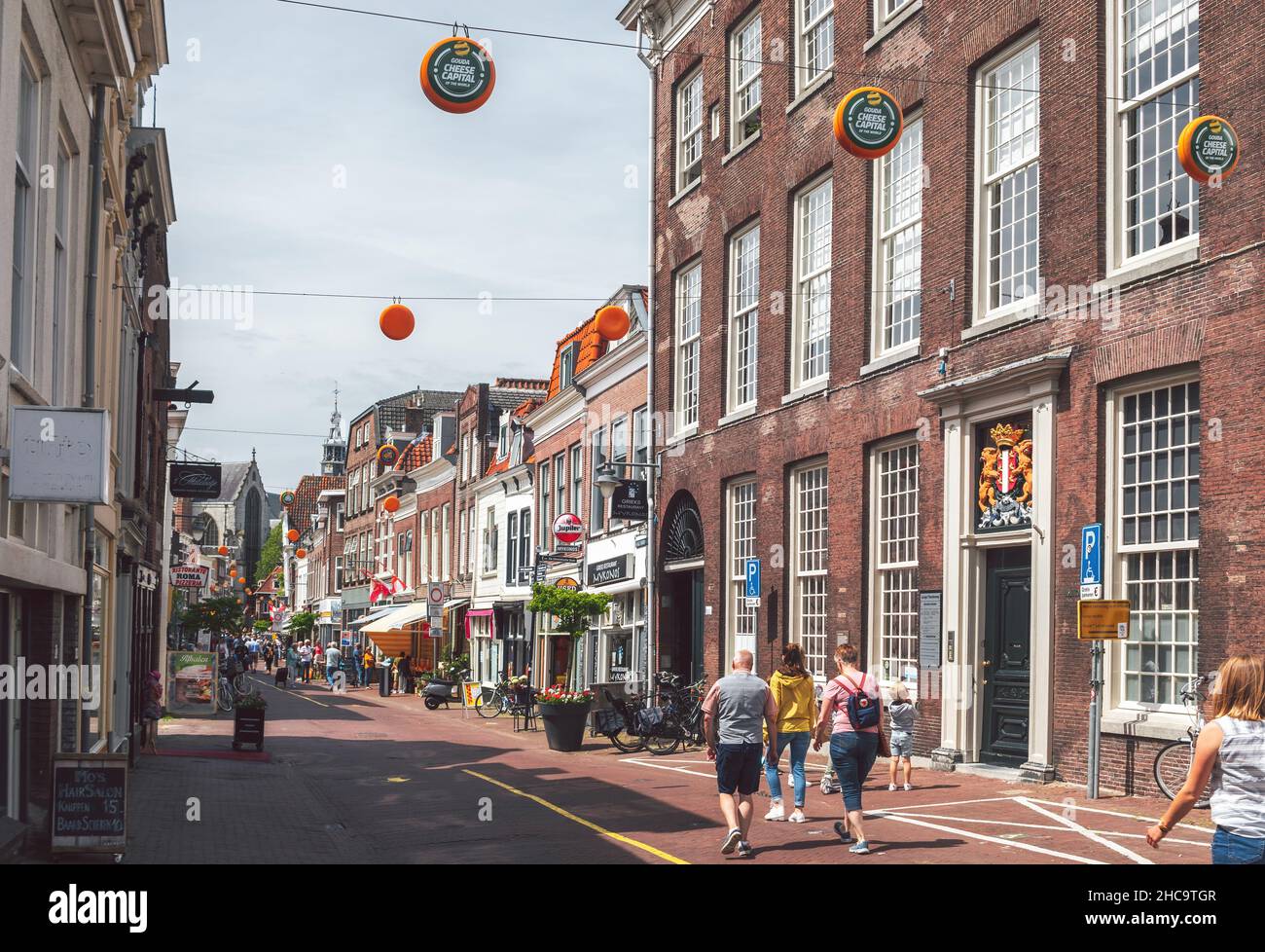 Sunny summer aerial cityscape of Gouda, cheese capital town in ...