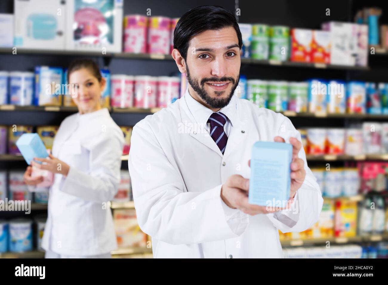 Happy pharmacist work place hi-res stock photography and images - Alamy