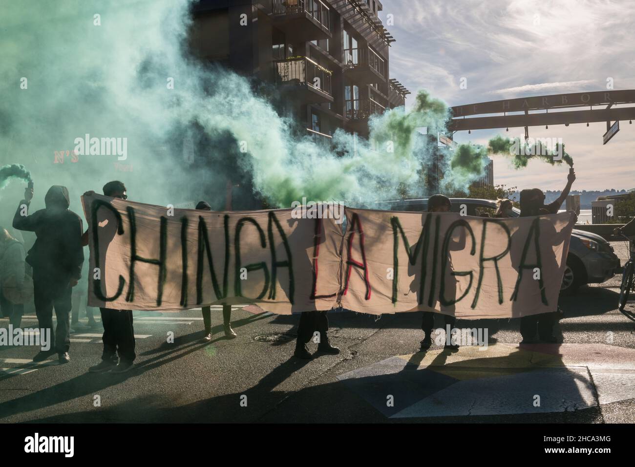 Seattle, USA. 25th Sep, 2021. Late in the day protestors setting off ...