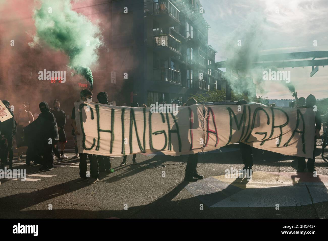 Seattle, USA. 25th Sep, 2021. Late in the day protestors setting off ...