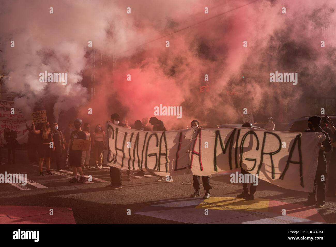 Seattle, USA. 25th Sep, 2021. Late in the day protestors setting off ...