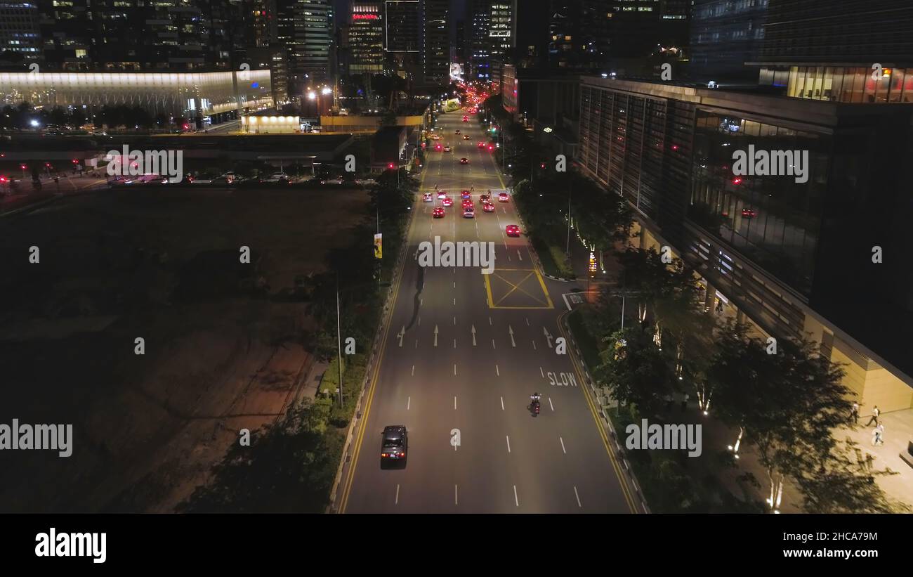 Top view of street with cars and modern buildings in big Chinese city ...