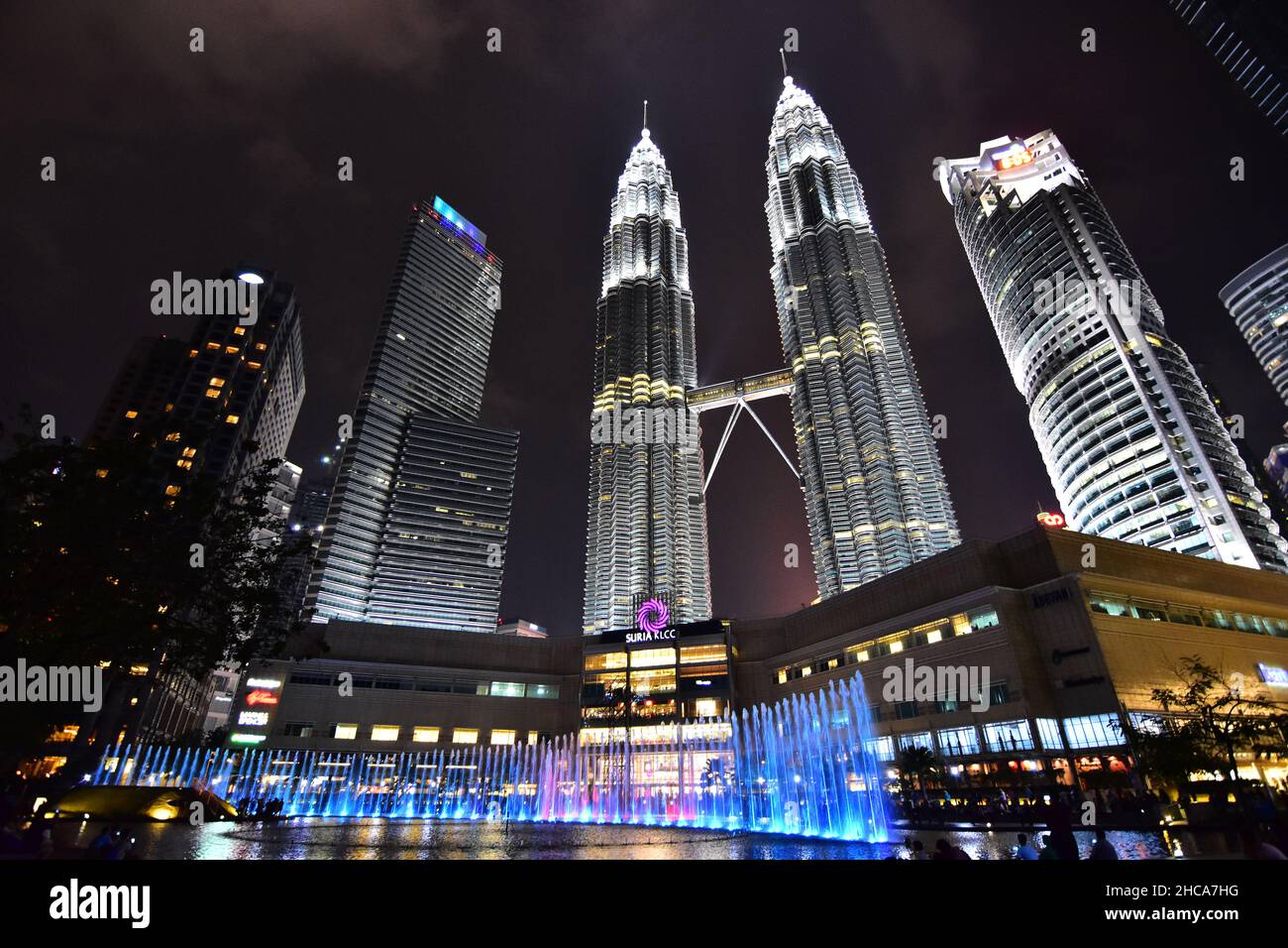 Famous Twin Towers illuminated at night in Kuala Lumpur, Malaysia Stock ...
