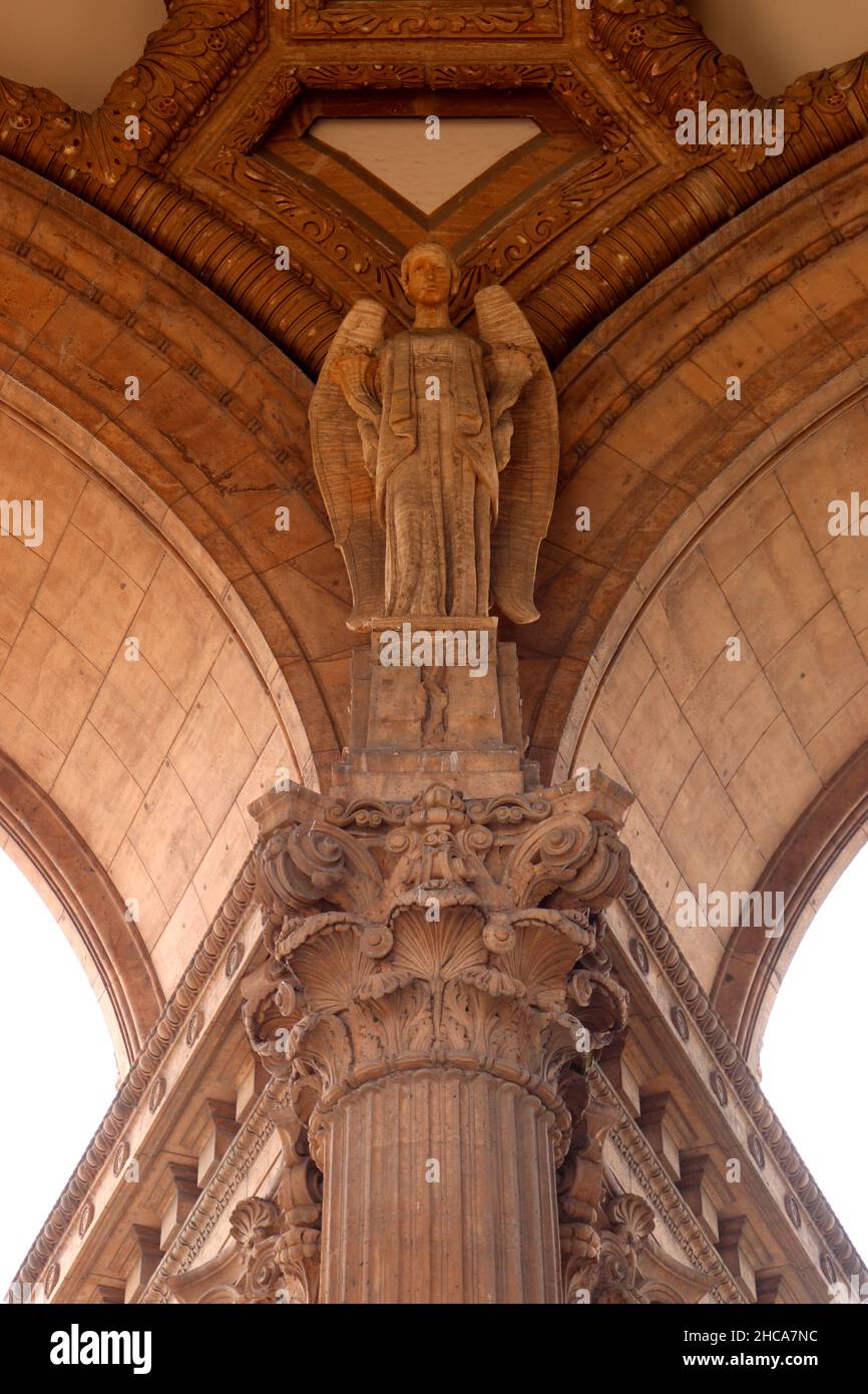 Beautifully carved arches and an angel sculpture in the Palace of Fine ...