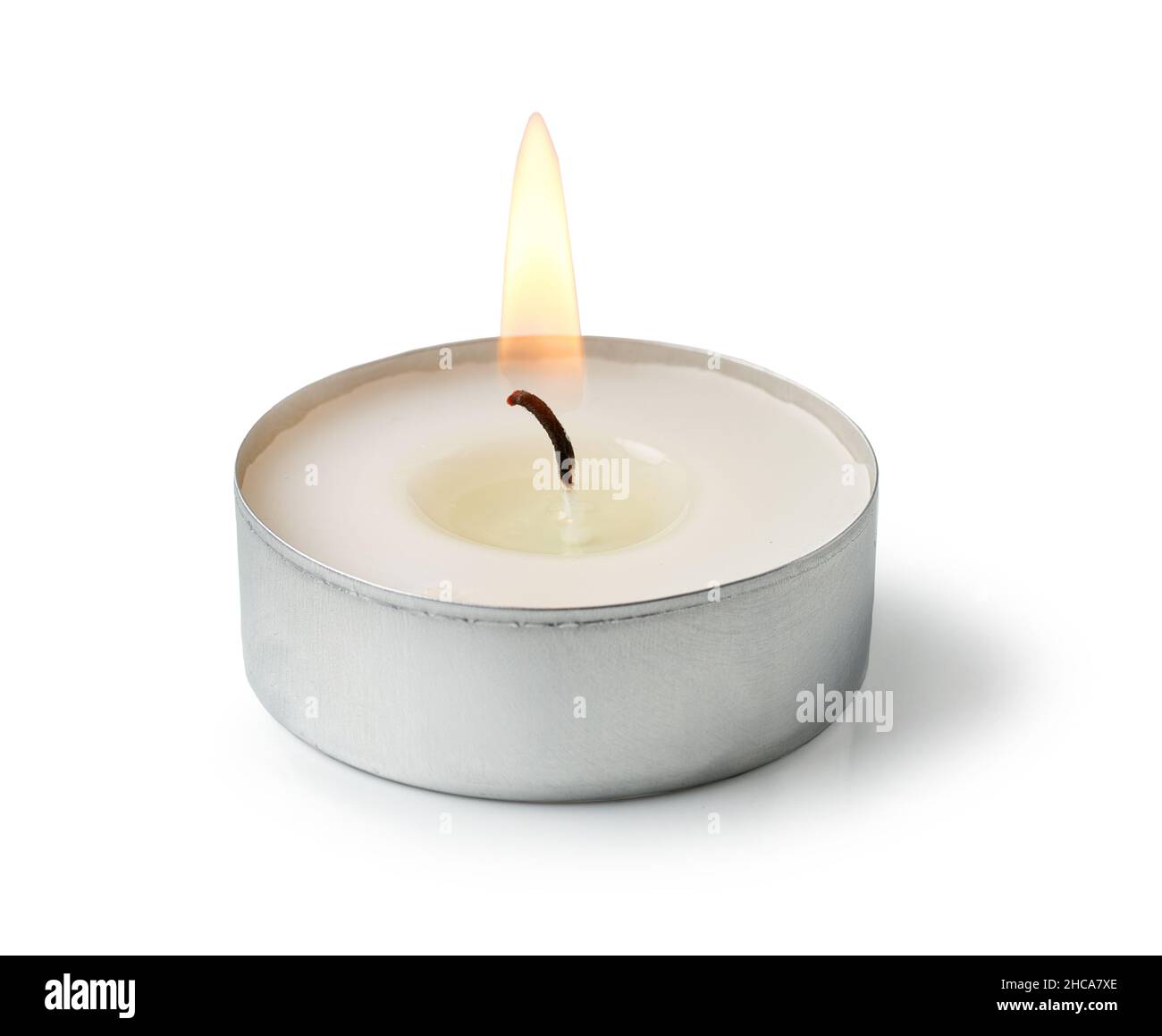 burning tea light candle isolated on white background Stock Photo - Alamy