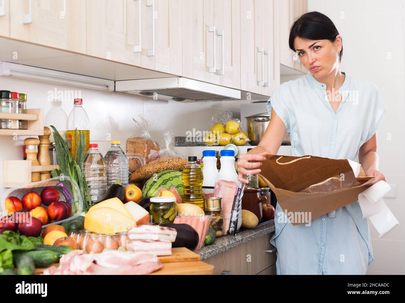 Female is forgot to buy banana Stock Photo - Alamy