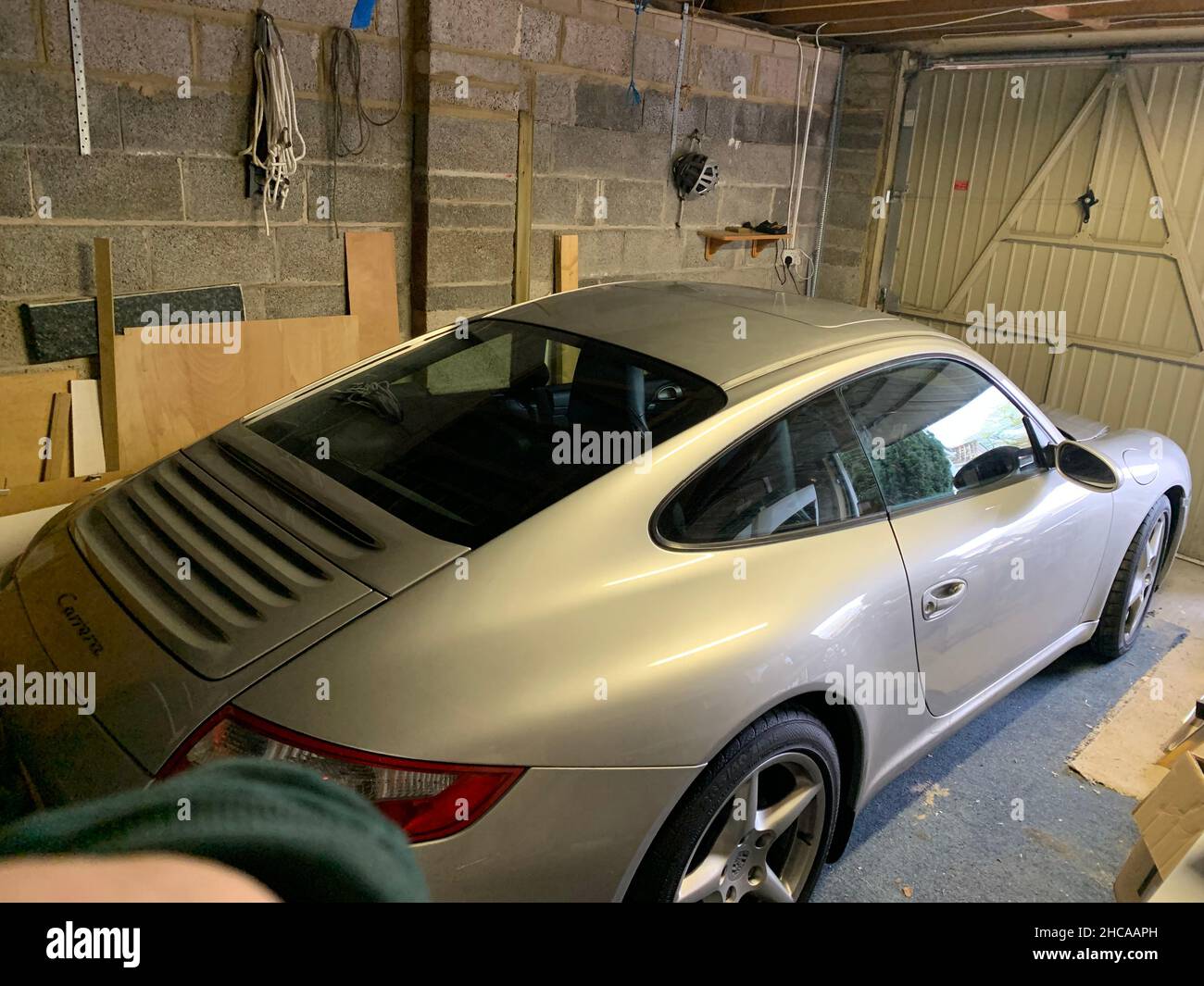 Porche 911 in garage silver sports car classic parked old style German ...