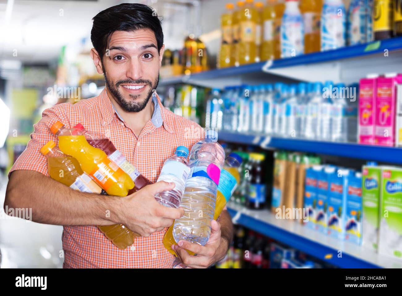Portrait of male who is standing with drinks Stock Photo - Alamy