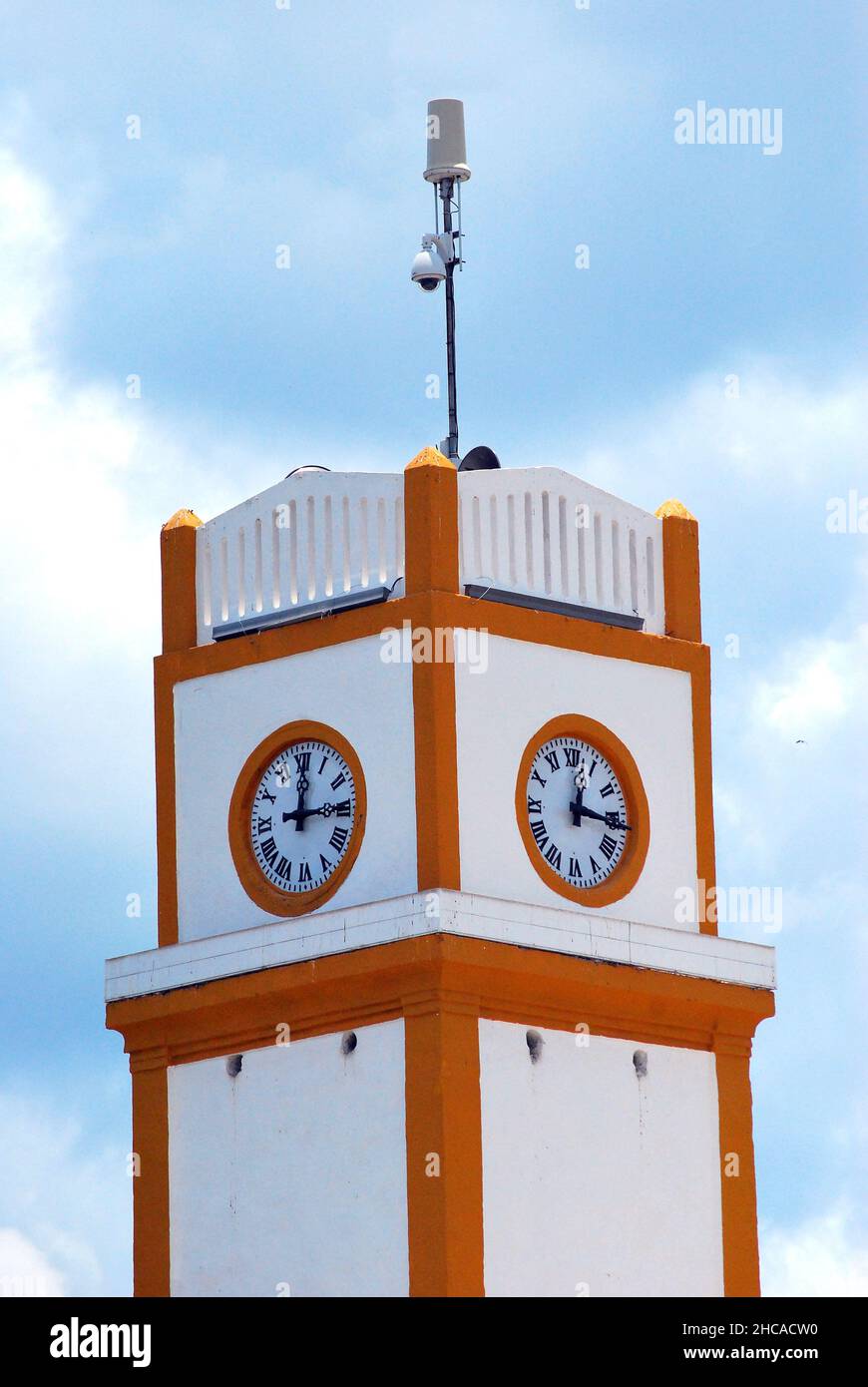 Beautiful shot of a Cozumel clock tower against a blue sky Stock Photo ...