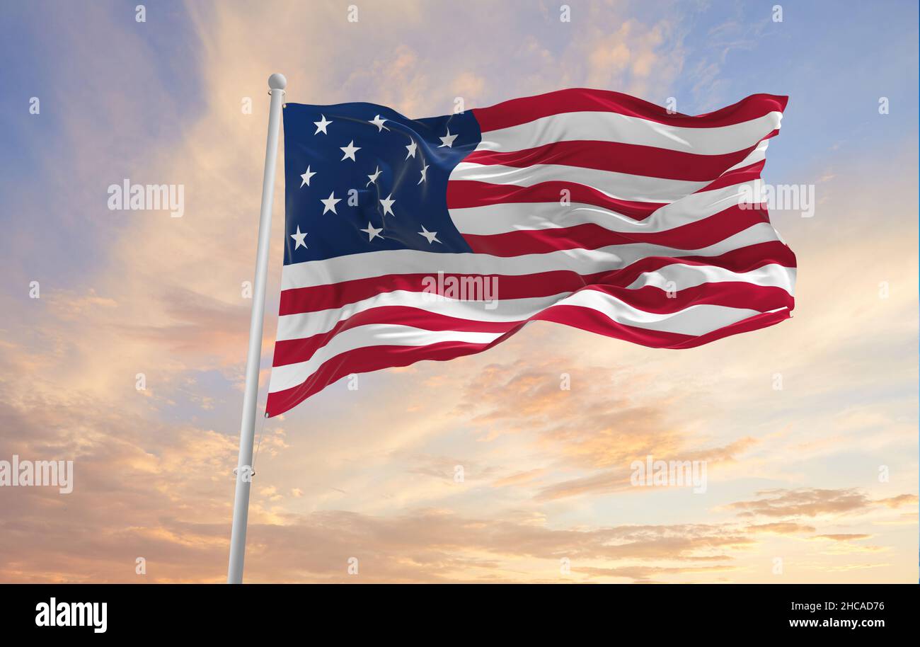 flag of United States 1777-1795 at cloudy sky background on sunset ...