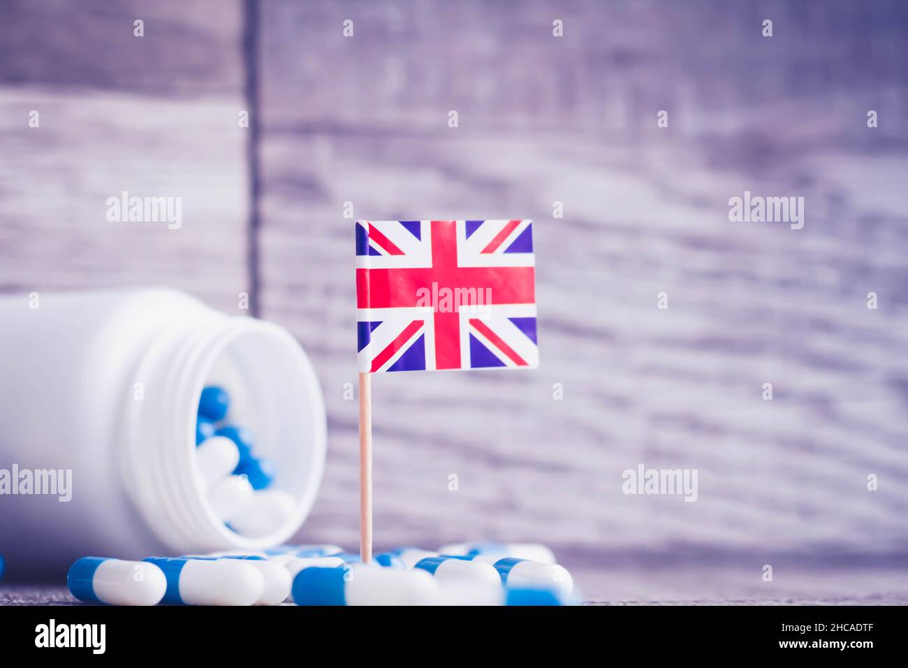 Medicines in the UK. Country flag and pills close up. Pharmacy products ...