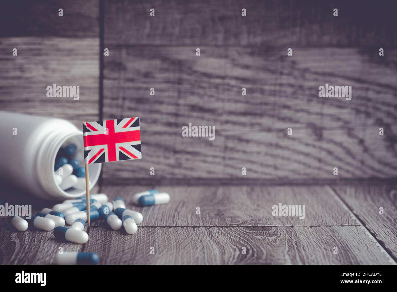 Medicines in the UK. Country flag and pills close up. Pharmacy products ...