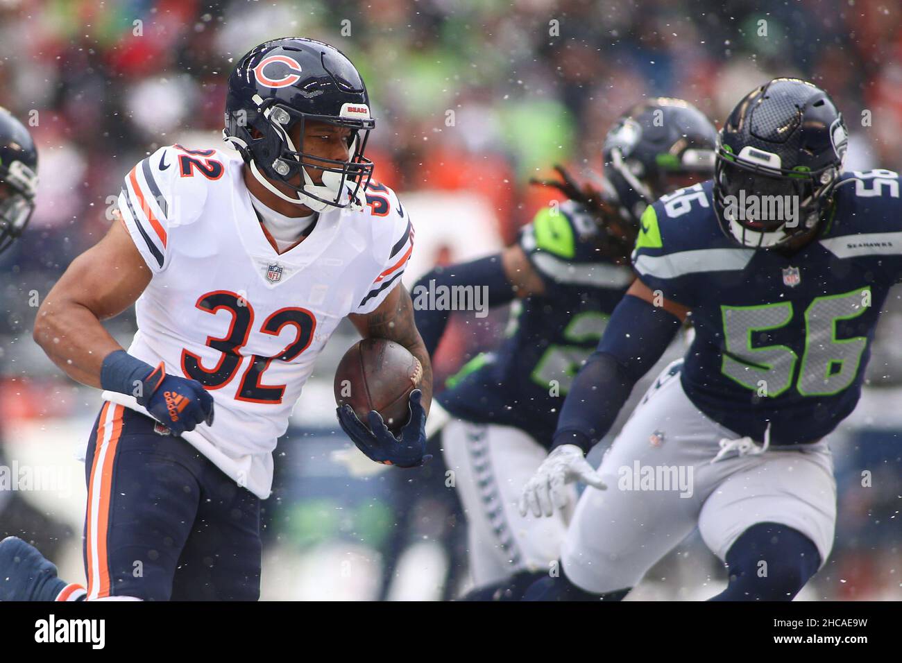 Seattle, WA, USA. 26th Dec, 2021. Chicago Bears running back David Montgomery (32) runs the ball ...