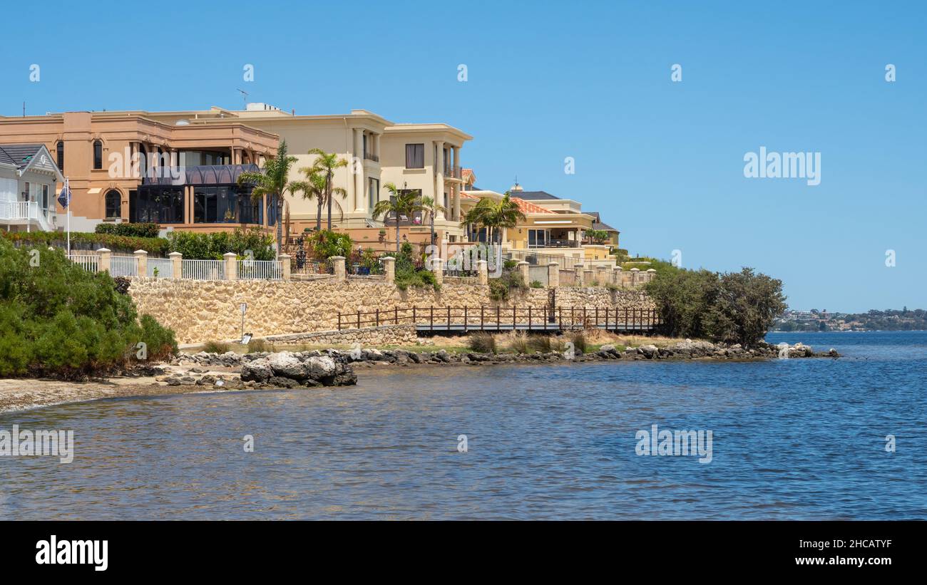 Upmarket houses facing the Swan River in the suburb of Applecross in ...