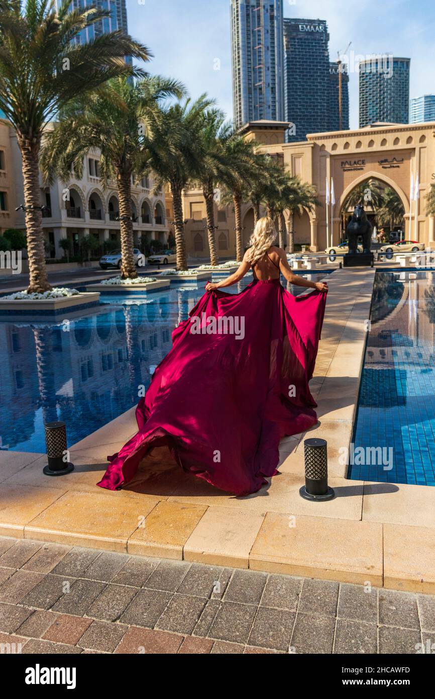 Dubai, UAE - 12.15.2021 - Model posing in downtown area during photo ...