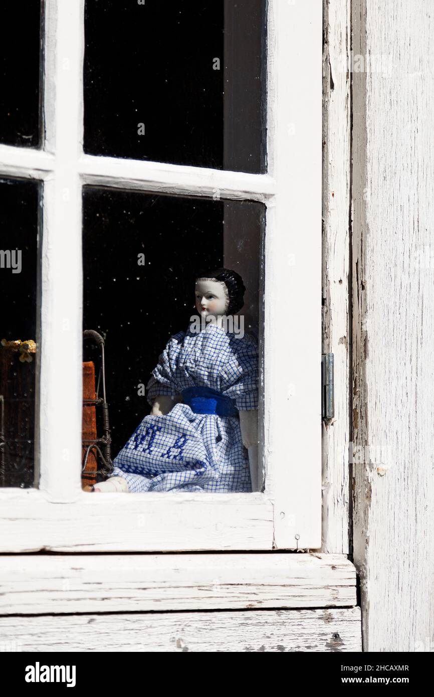 scary doll in the window of an old house Stock Photo - Alamy