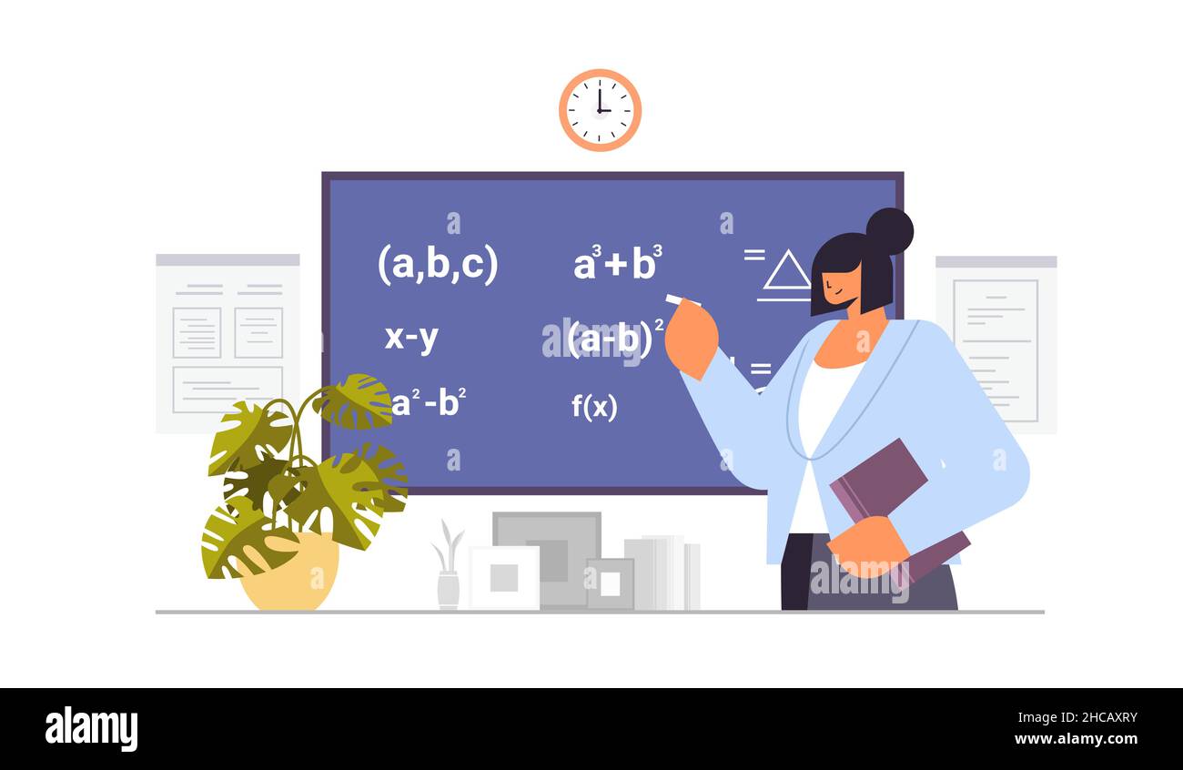 female teacher solving math problem on digital chalkboard during lesson ...