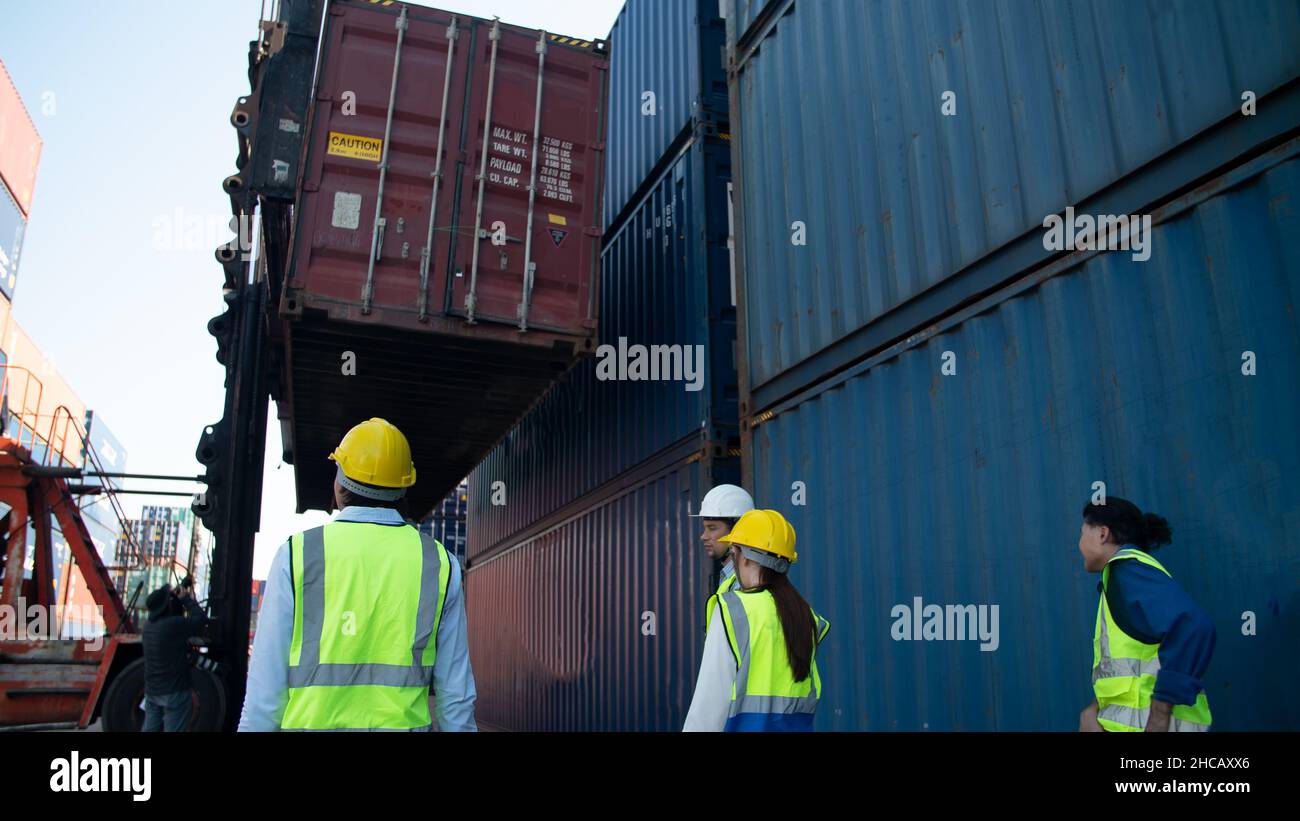 Containers loading on harbor port Stock Photo - Alamy